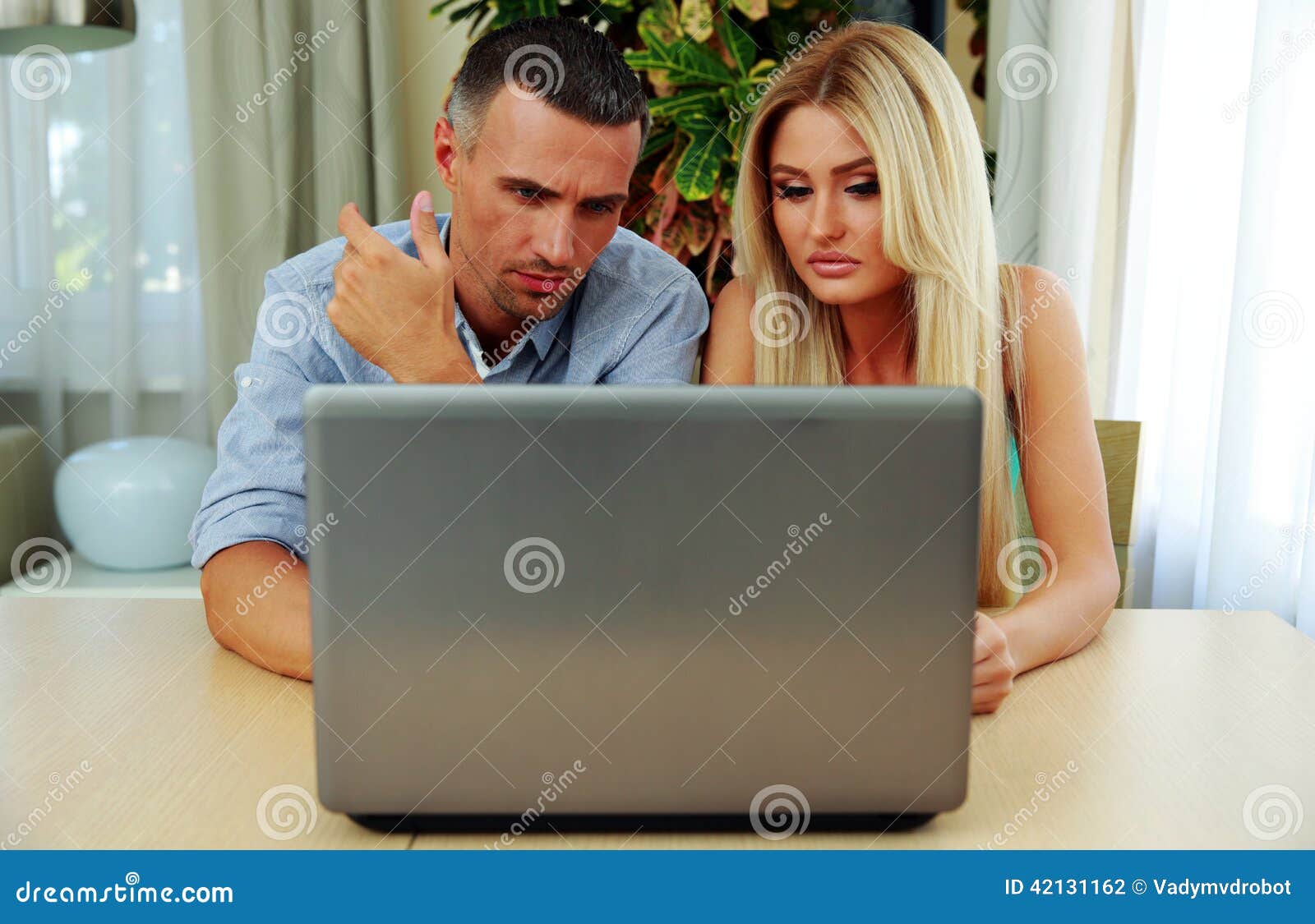 Couple Using Laptop Together Stock Photo - Image of internet ...