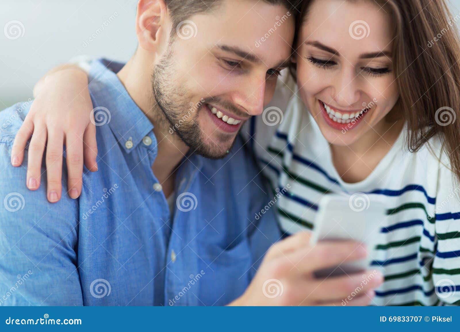 Couple Using Mobile Phone Together Stock Image - Image of close ...