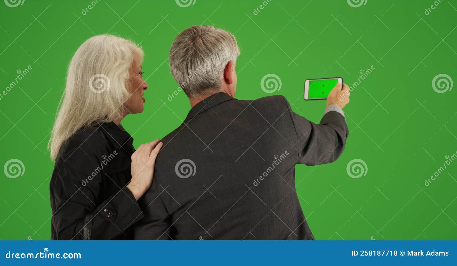 Couple Using Smartphone with Green Screen on White Background on Green ...