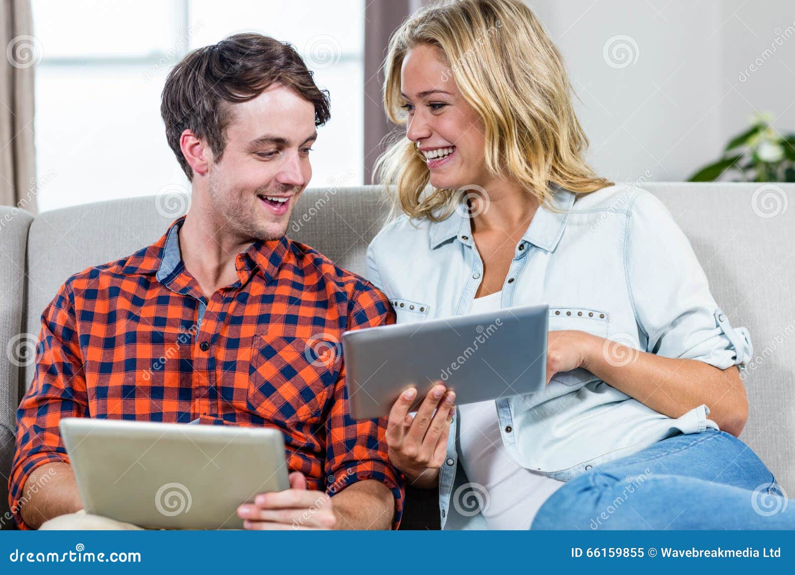 Couple Using Tablet Computers Stock Image - Image of lifestyle, people ...