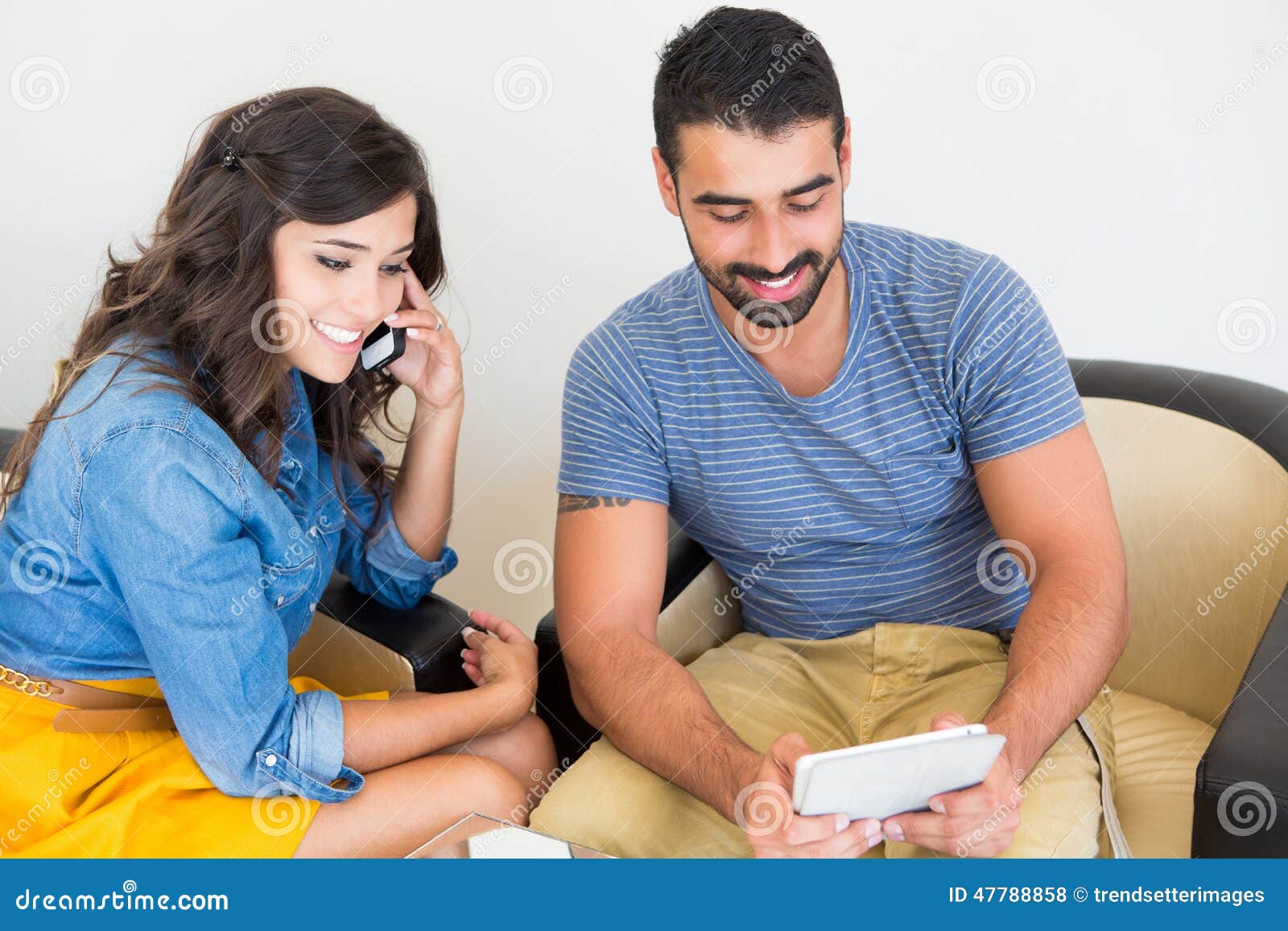 Couple using tech stock photo. Image of cellphone, lifestyle - 47788858
