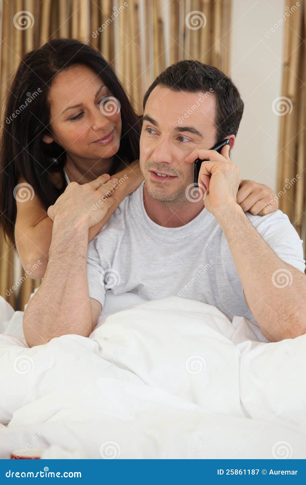 Couple using a telephone stock image. Image of call, male - 25861187