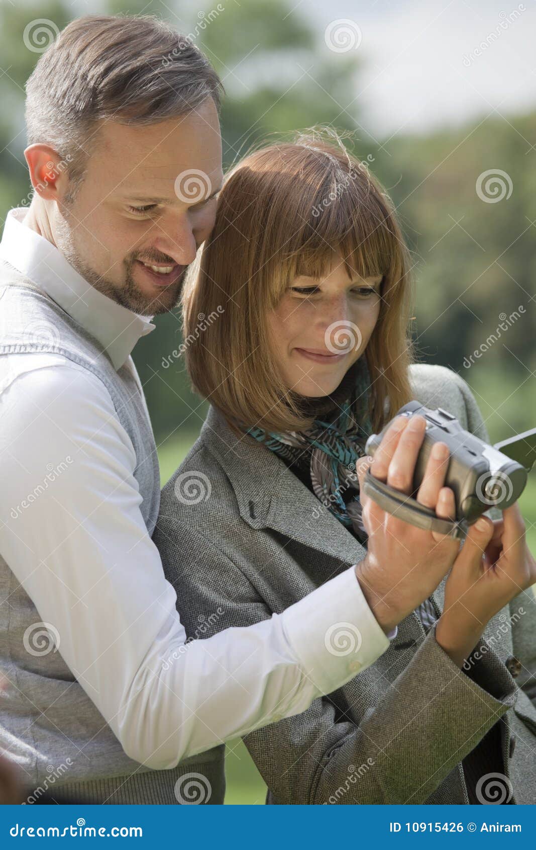 Couple with video camera stock photo. Image of male, camera - 10915426