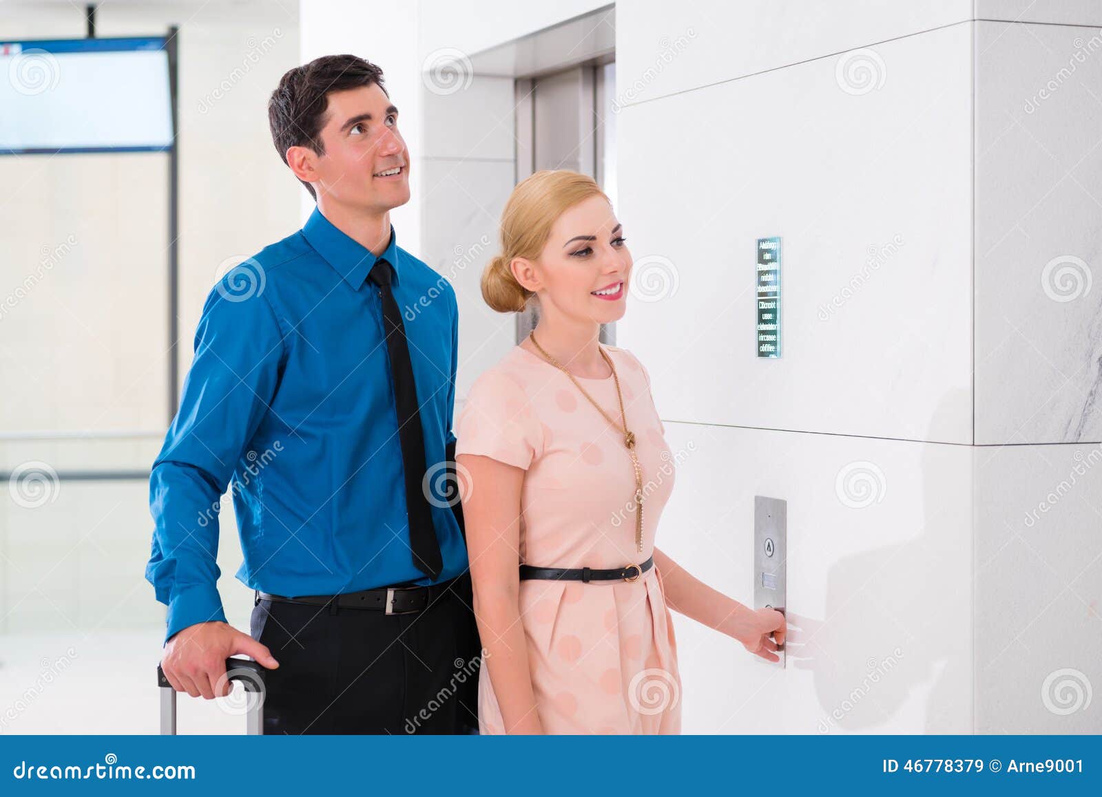 Couple Waiting for Hotel Elevator Stock Image - Image of holiday ...