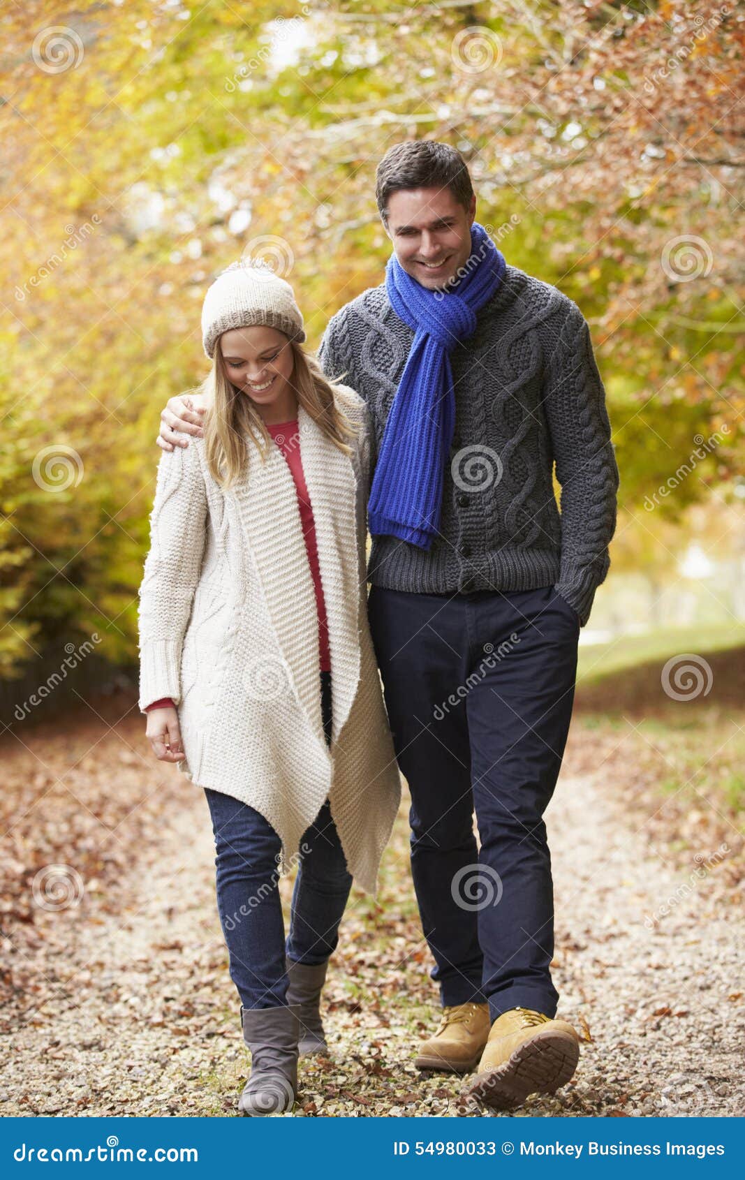 Couple Walking Along Autumn Path Stock Image - Image of happy, forties ... Couple Walking Along Autumn Path Stock Image - Image of happy, forties ...