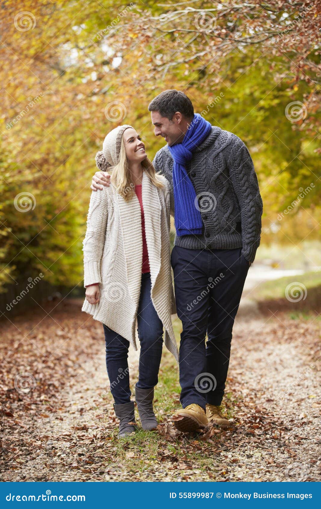 Couple Walking Along Autumn Path Stock Image - Image of countryside ...