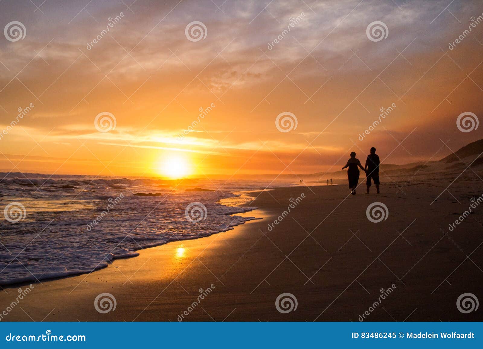 Couple Walking on Beach at Sunset Stock Image - Image of water, ocean ...