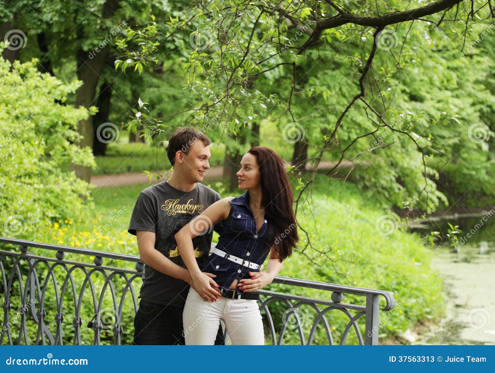 Couple walking on a bridge stock image. Image of handsome - 37563313