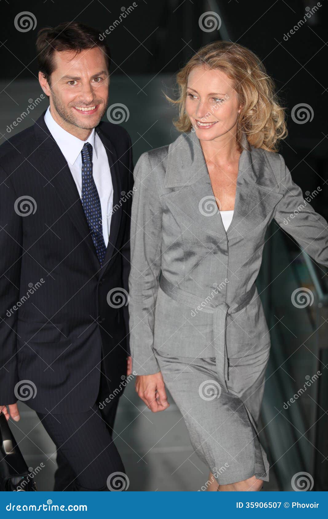 Couple walking down a ramp stock image. Image of couple - 35906507