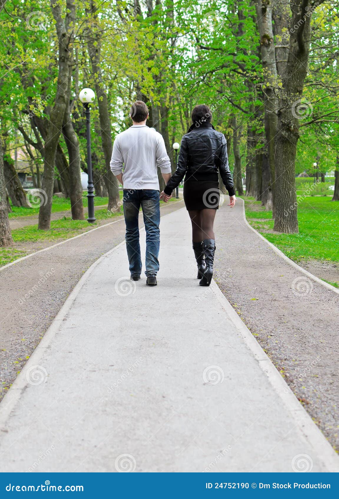 Couple Walking Down the Road Stock Photo - Image of holding, romantic ...
