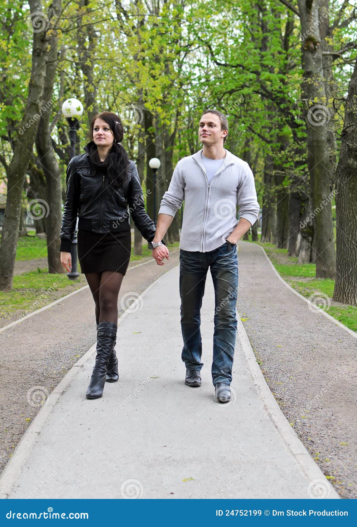 Couple Walking Down the Road Stock Image - Image of couple, lifestyle ...