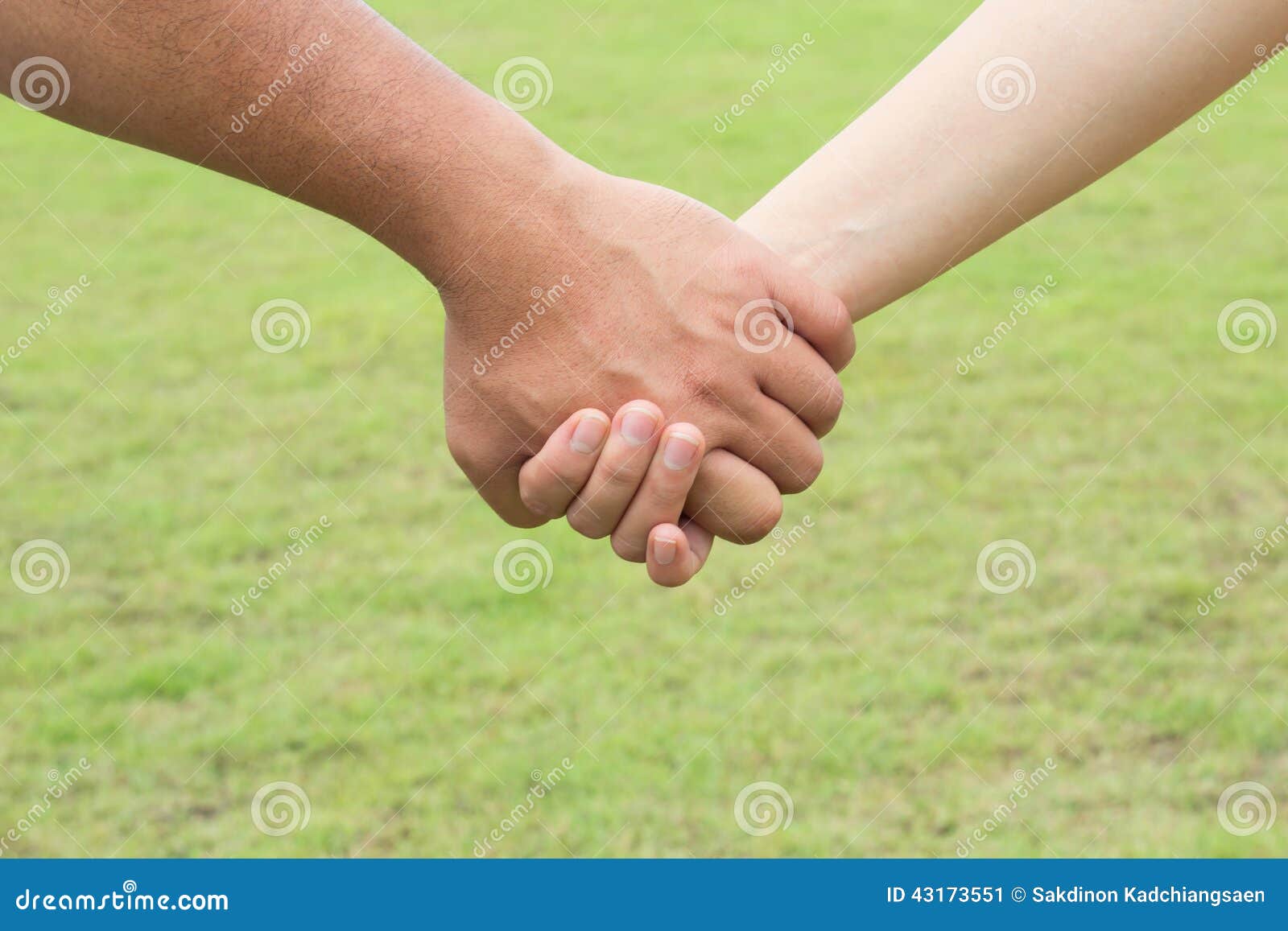 Two People Walking Hand In Hand