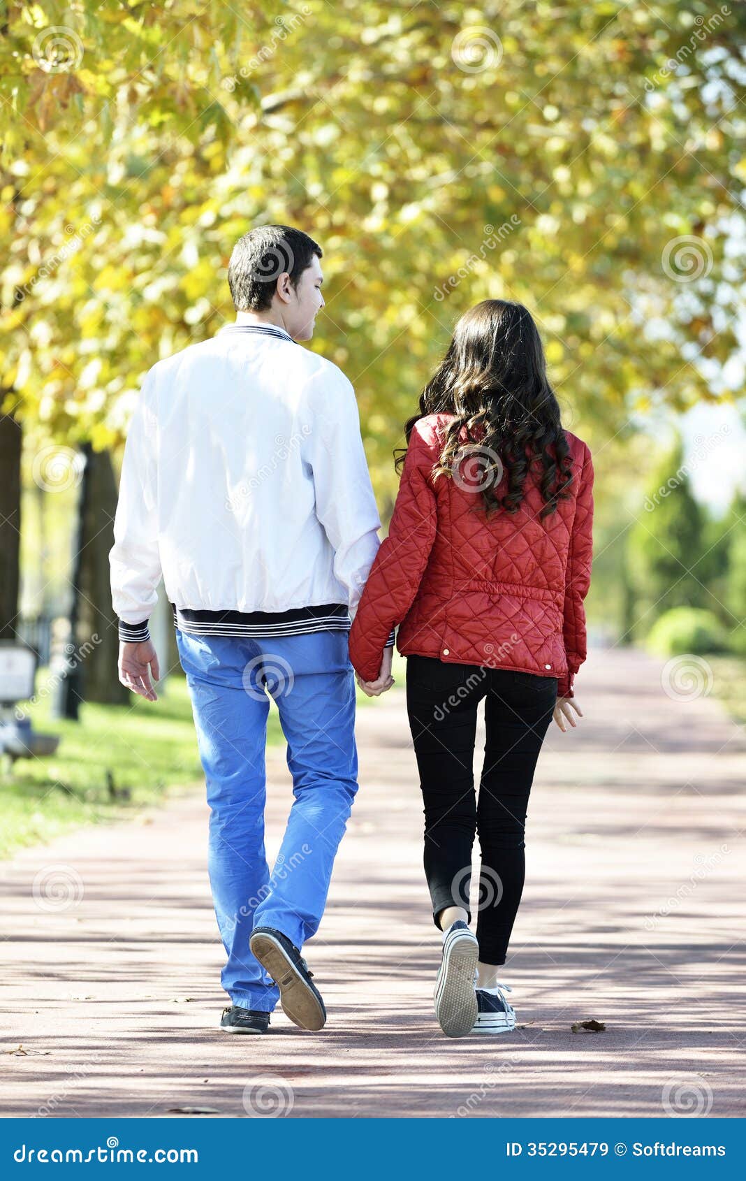 Couple walking stock image. Image of green, jacket, beauty - 35295479