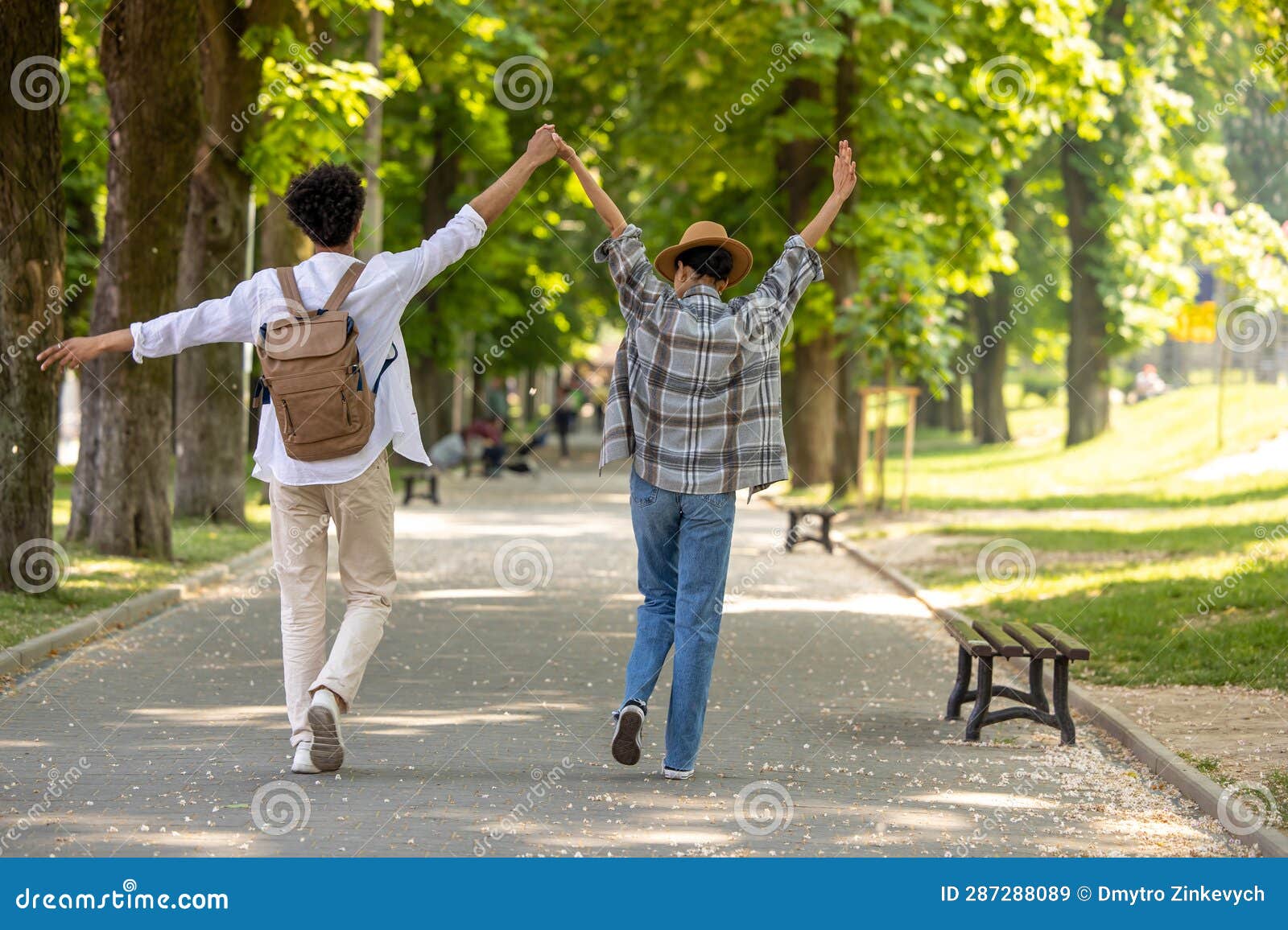 A Couple Walking in the Park and Looking Excited and Enjoyed Stock ...
