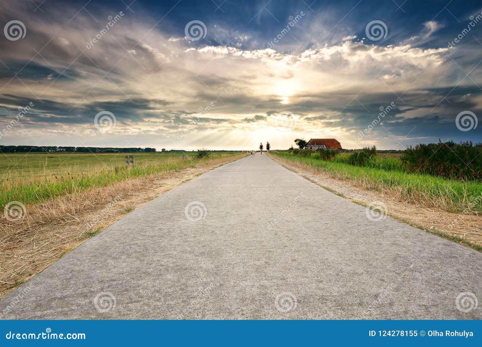 Couple Walking on Path Over Dramatic Sky Stock Image - Image of ...