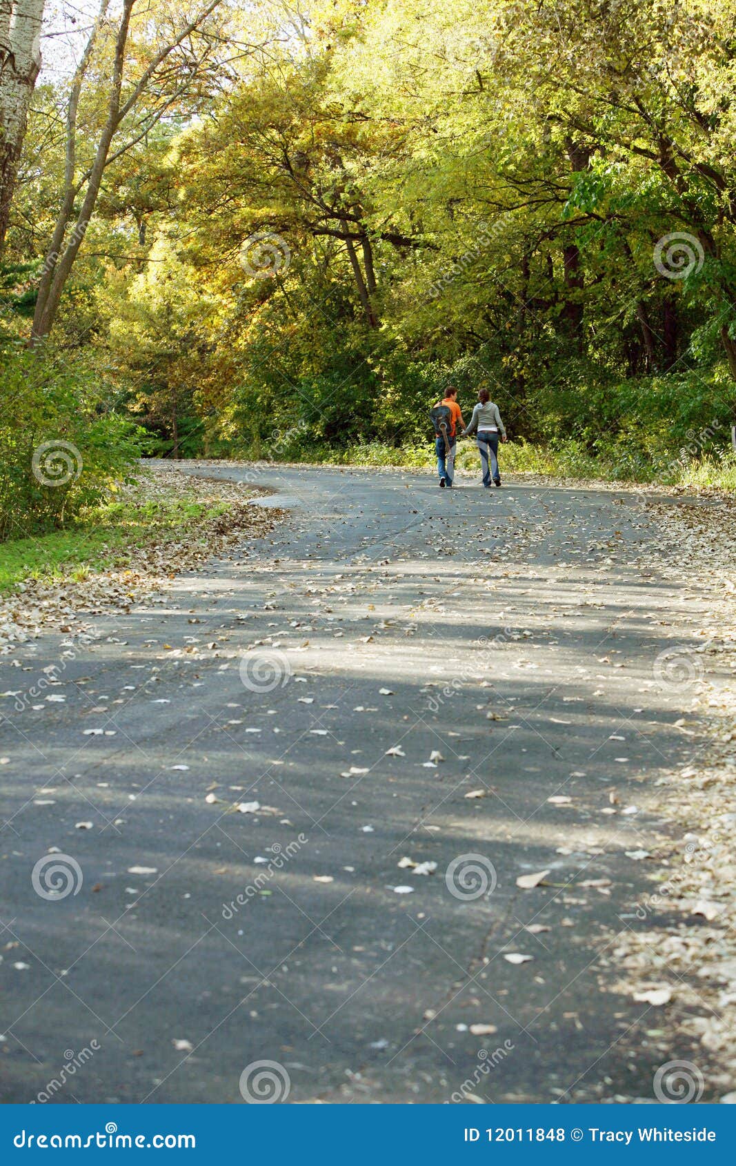 Couple walking on road stock photo. Image of person, beauty - 12011848
