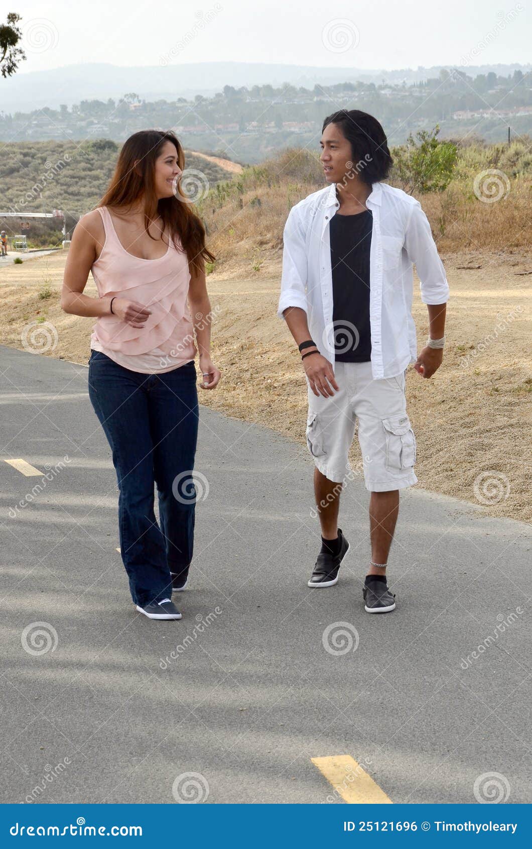 Couple Walking and Talking stock photo. Image of hiking - 25121696