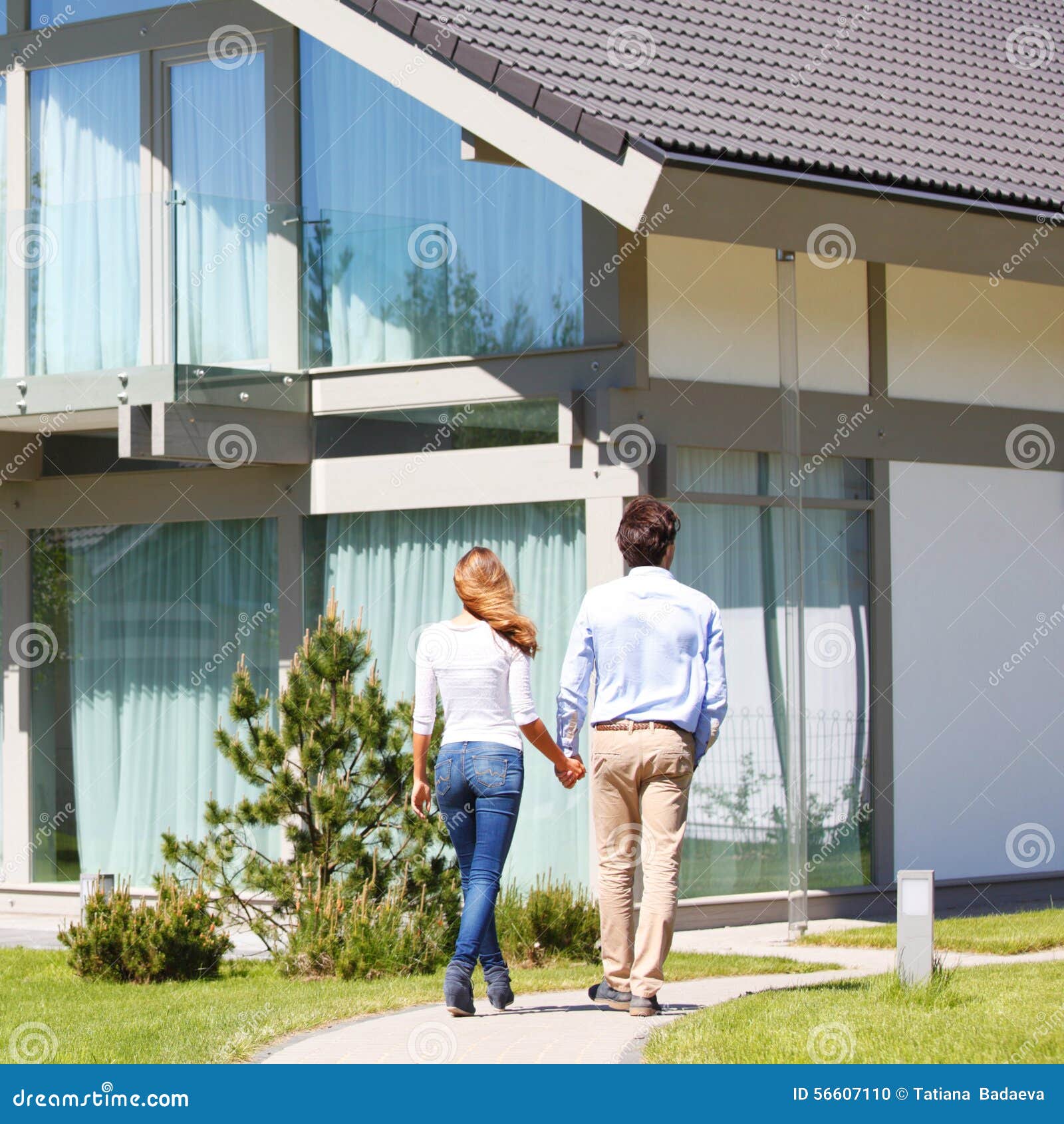 Couple Walking Towards House Stock Photo - Image of holding, husband ...