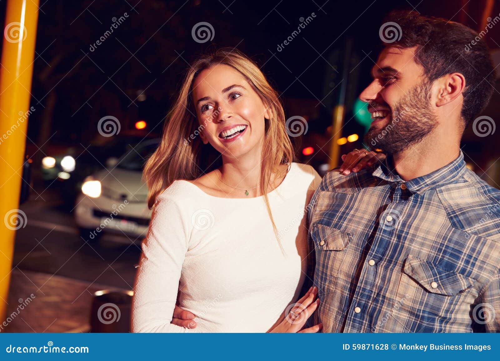 Couple Walking through Town Together at Night Stock Photo - Image of ...