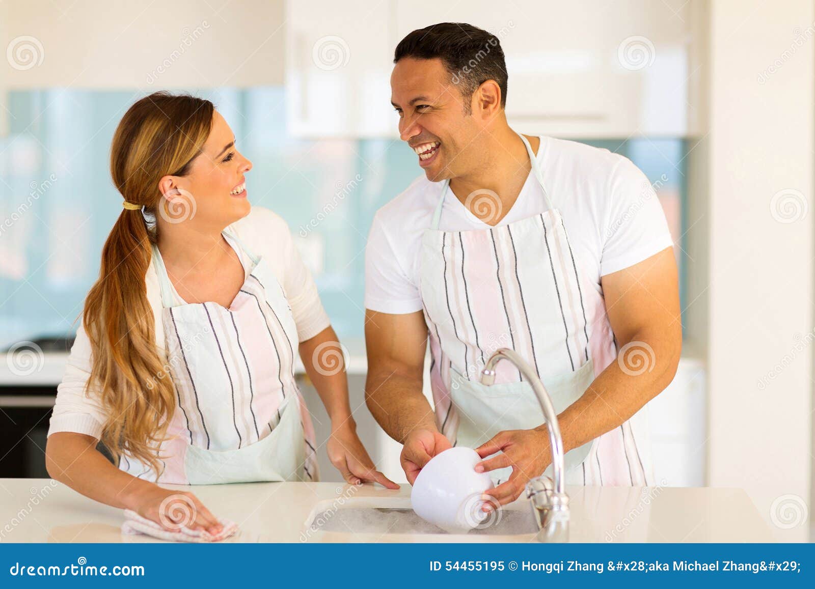Couple washing dishes stock image. Image of household - 54455195