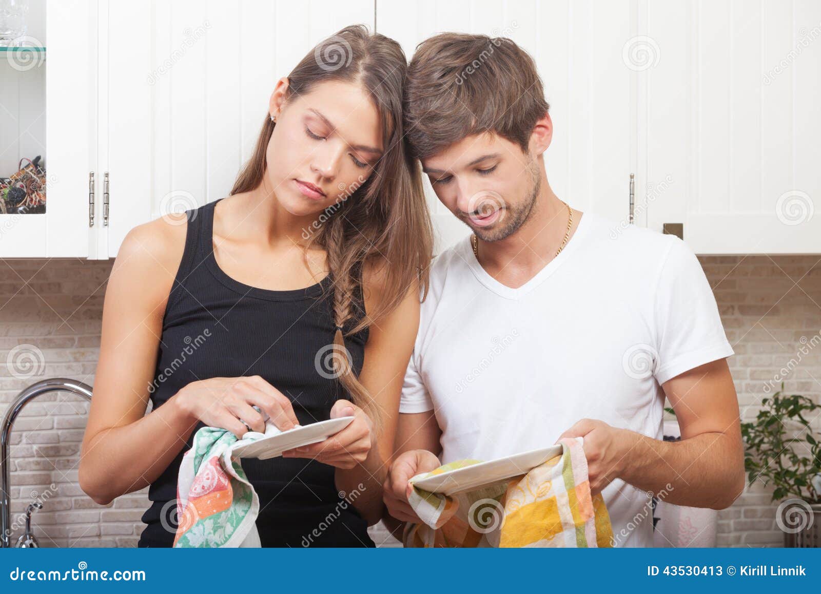 Couple washing dishes stock image. Image of male, cute - 43530413