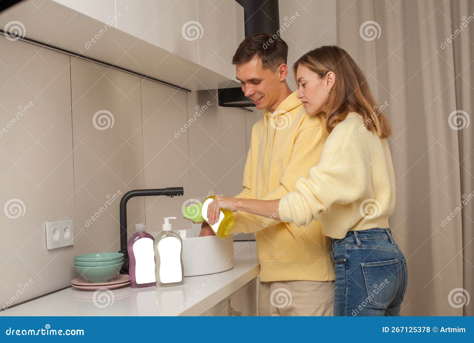 Couple Washing the Dishes Using Dishwashing Liquid with Blank Label ...