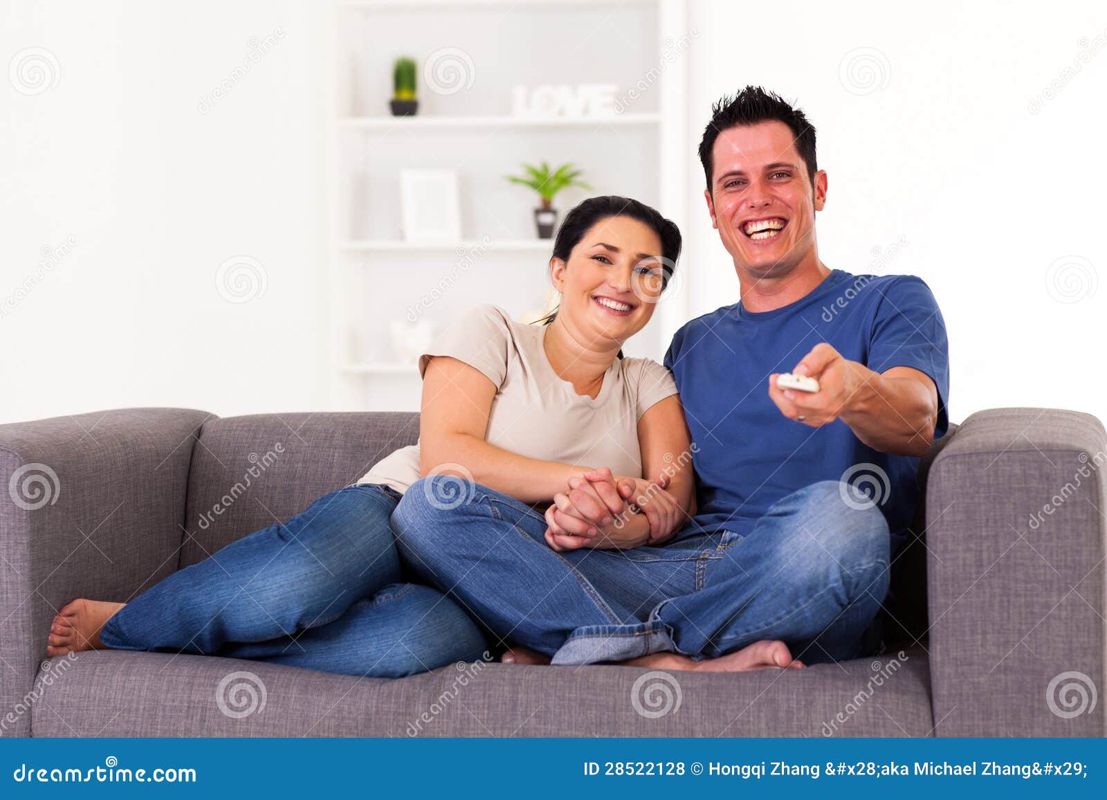 Couple watching comedy stock photo. Image of entertainment - 28522128