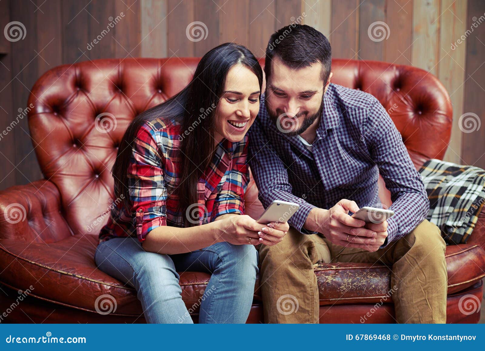 Couple Watching Joyful Application on the Phone Stock Photo - Image of ...