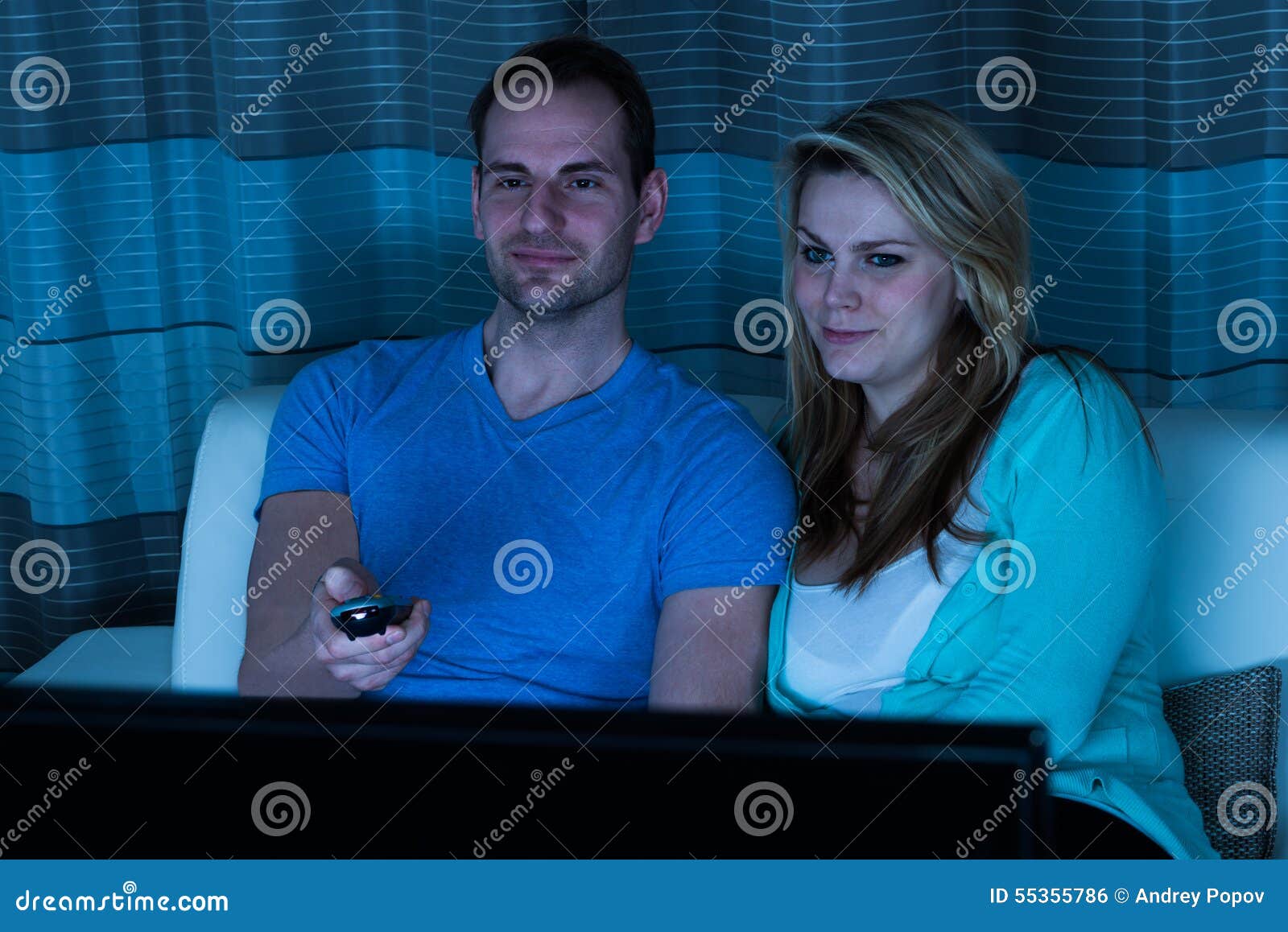 Couple Watching Movie at Home Stock Photo - Image of house, night: 55355786