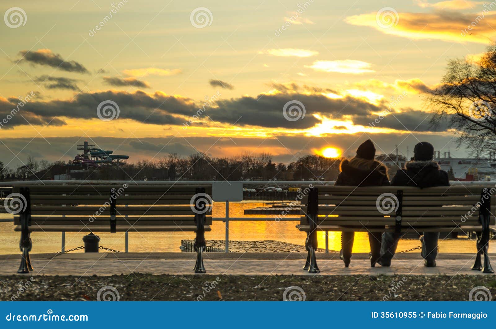 Couple watching the sunset stock image. Image of love - 35610955
