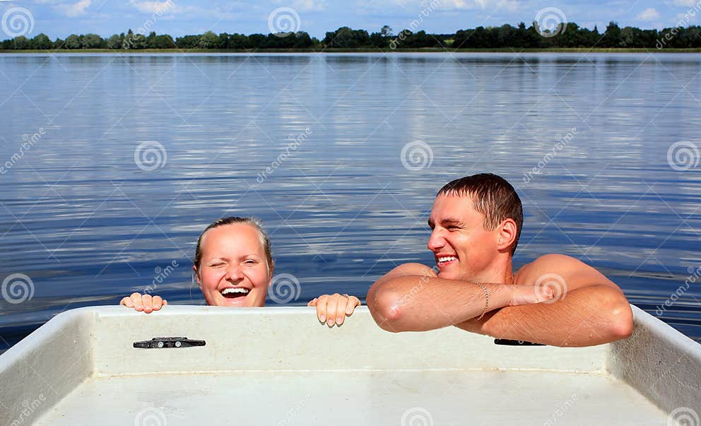 Couple in the water stock photo. Image of body, outside - 11413916