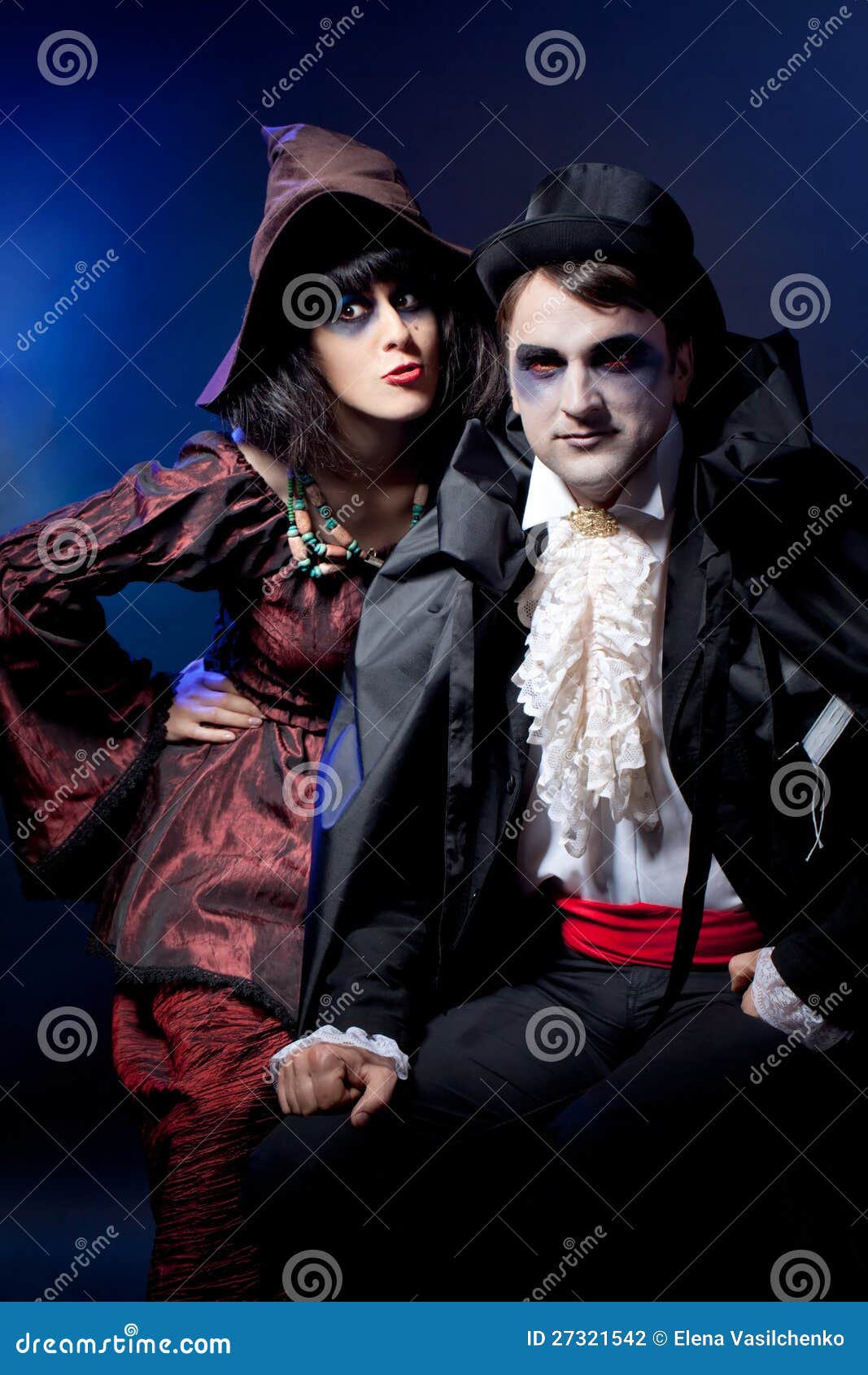 Couple Wearing As Vampire and Witch. Stock Photo - Image of female ...