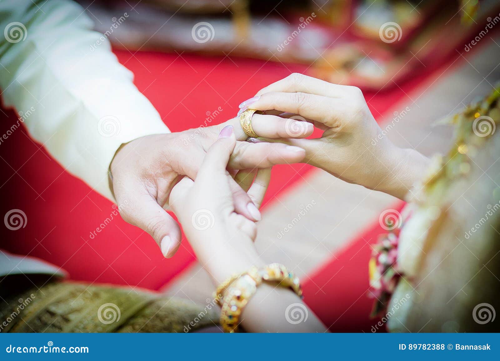 Couple Wearing Wedding Ring Stock Photo - Image of fashion, flower ...