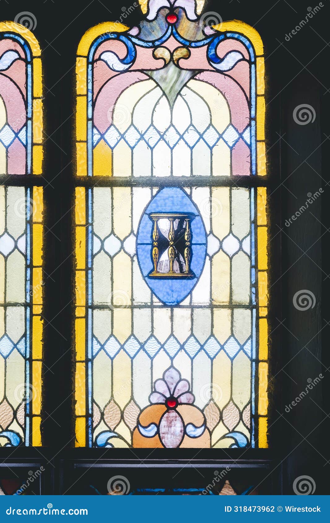 A Couple of Windows Sitting Next To Each Other on a Wall Stock Photo ...