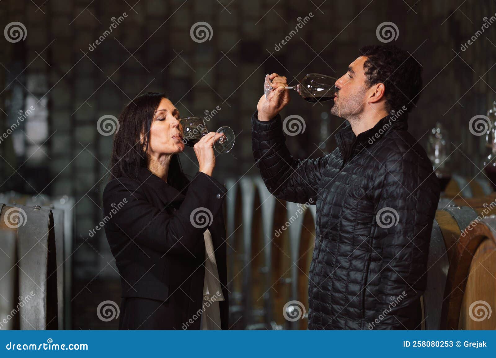 Couple during a Wine Tasting in a Wine Cellar Stock Image - Image of ...