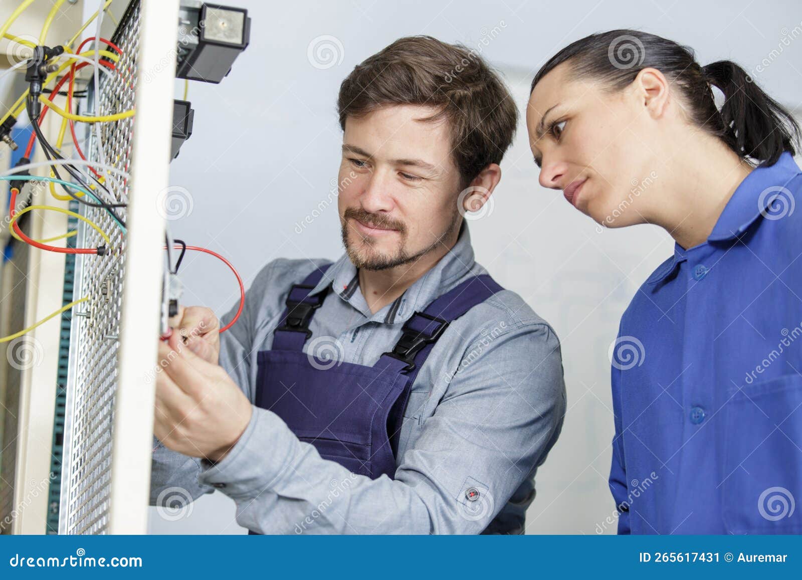 Couple Working on Assembling Circuit Components Stock Image - Image of ...