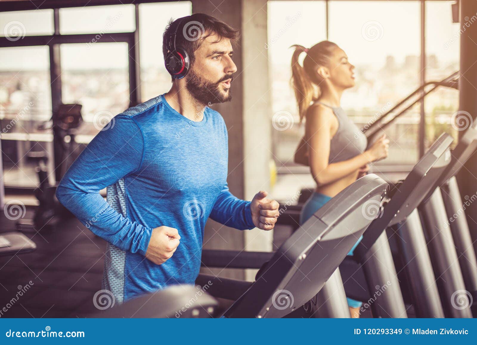 Man Running On Treadmill Machine At Gym Sports Club. Fitness Healthy ...