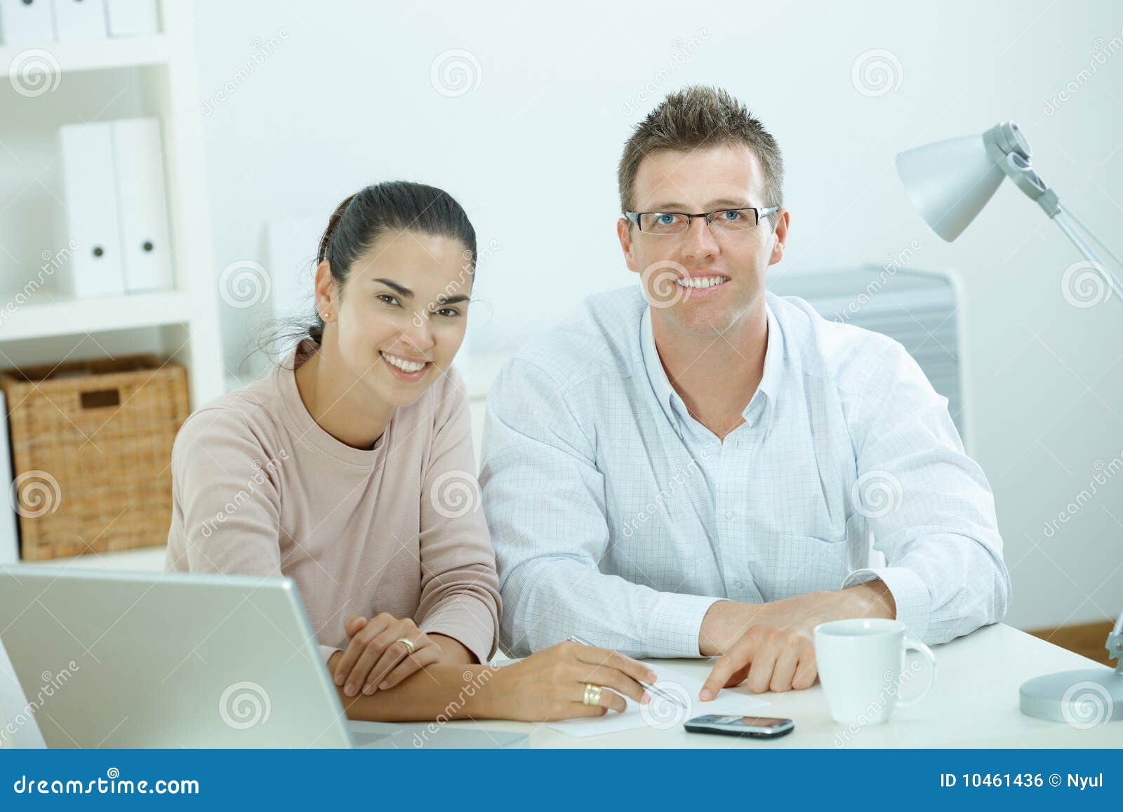 Couple working at home stock photo. Image of husband - 10461436
