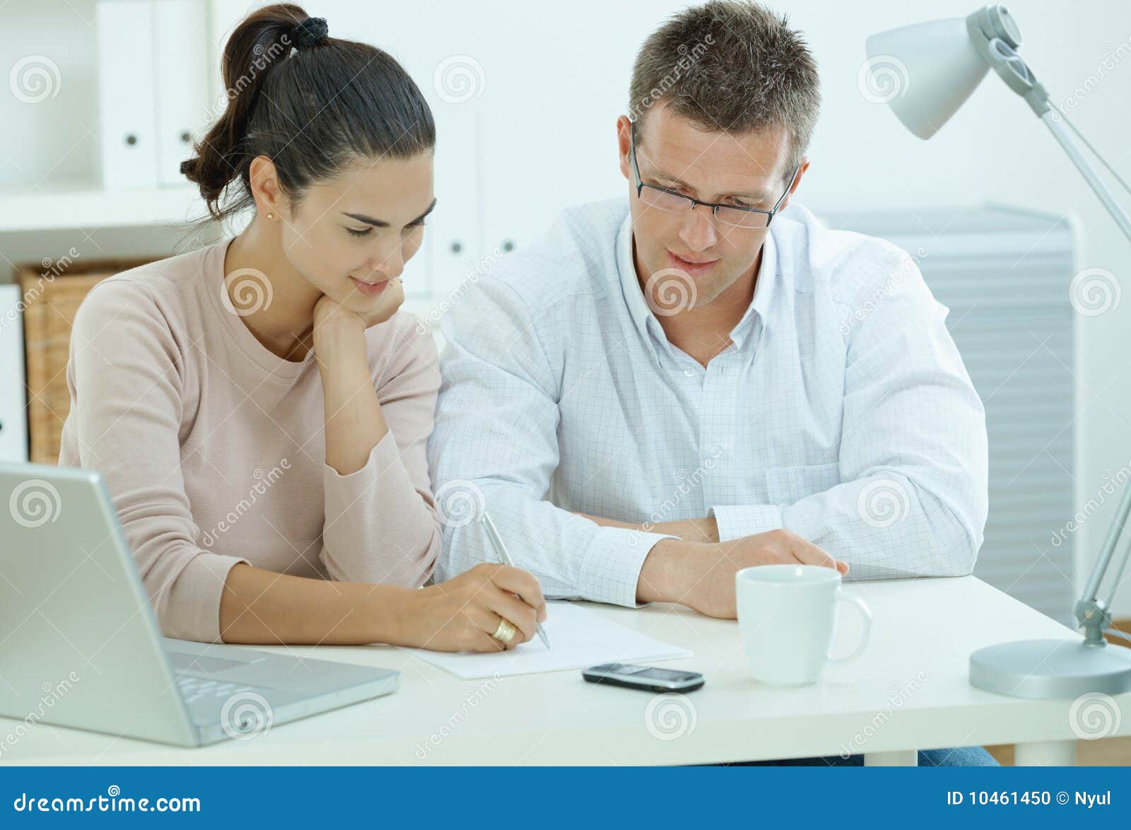 Couple working at home stock photo. Image of homework - 10461450
