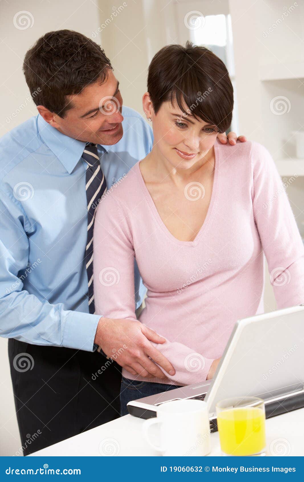 Couple Working from Home stock photo. Image of young - 19060632