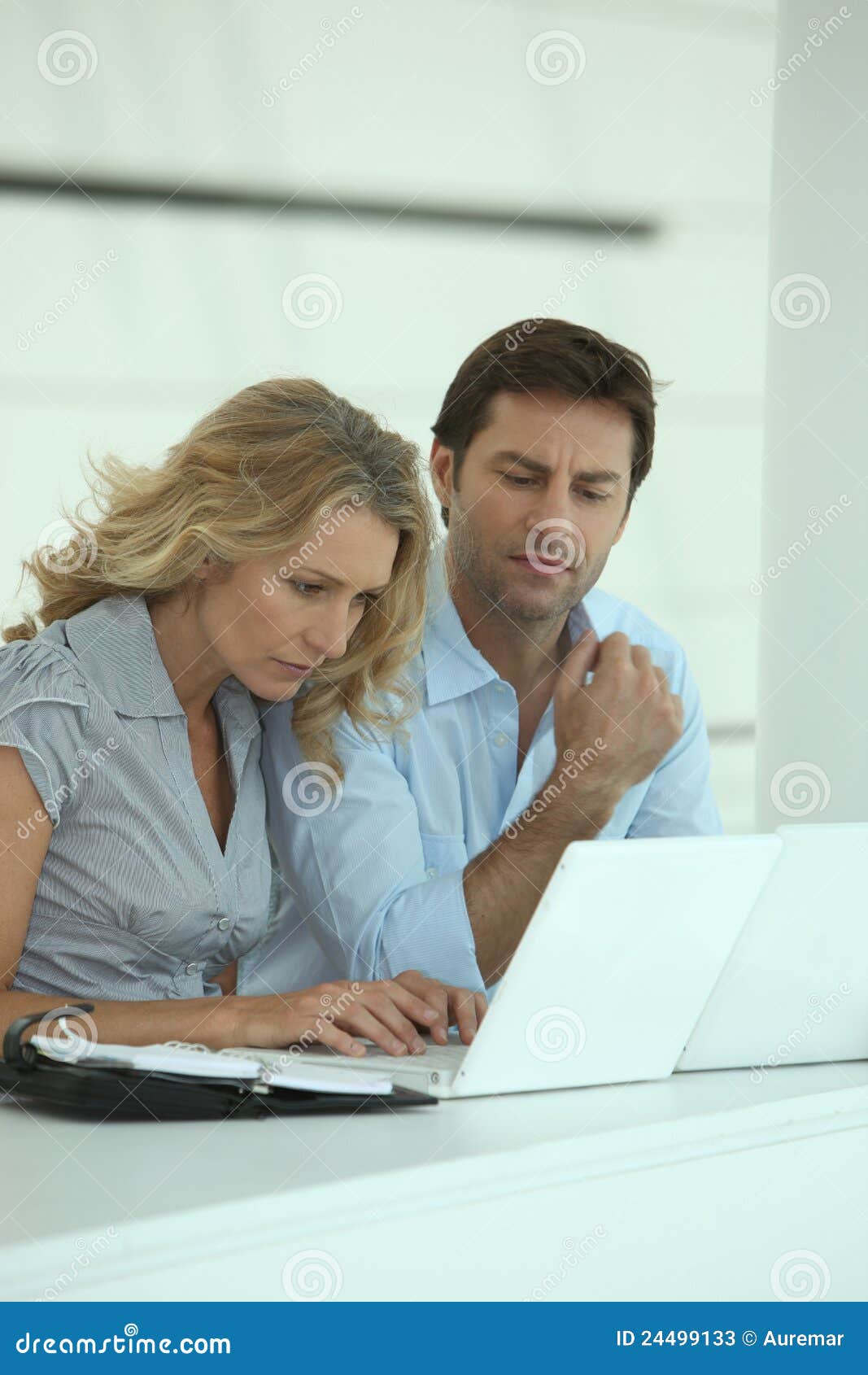 Couple working from home stock image. Image of front - 24499133
