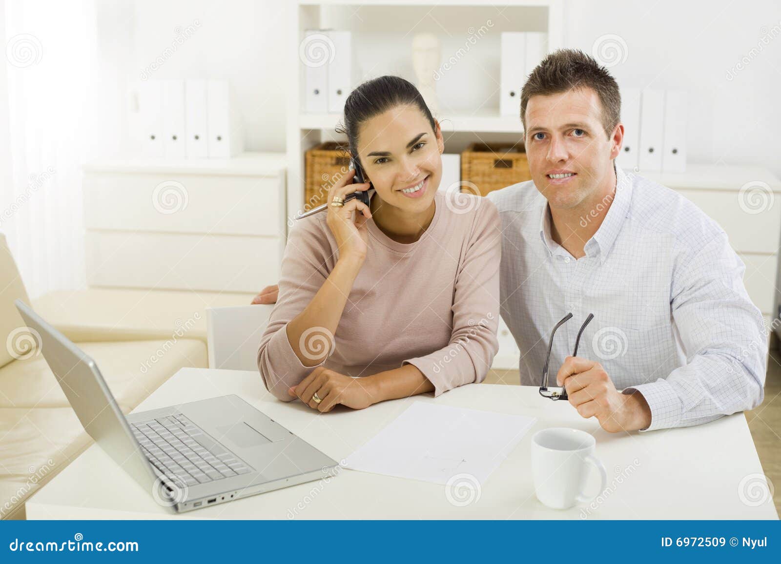 Couple working at home stock image. Image of computer - 6972509