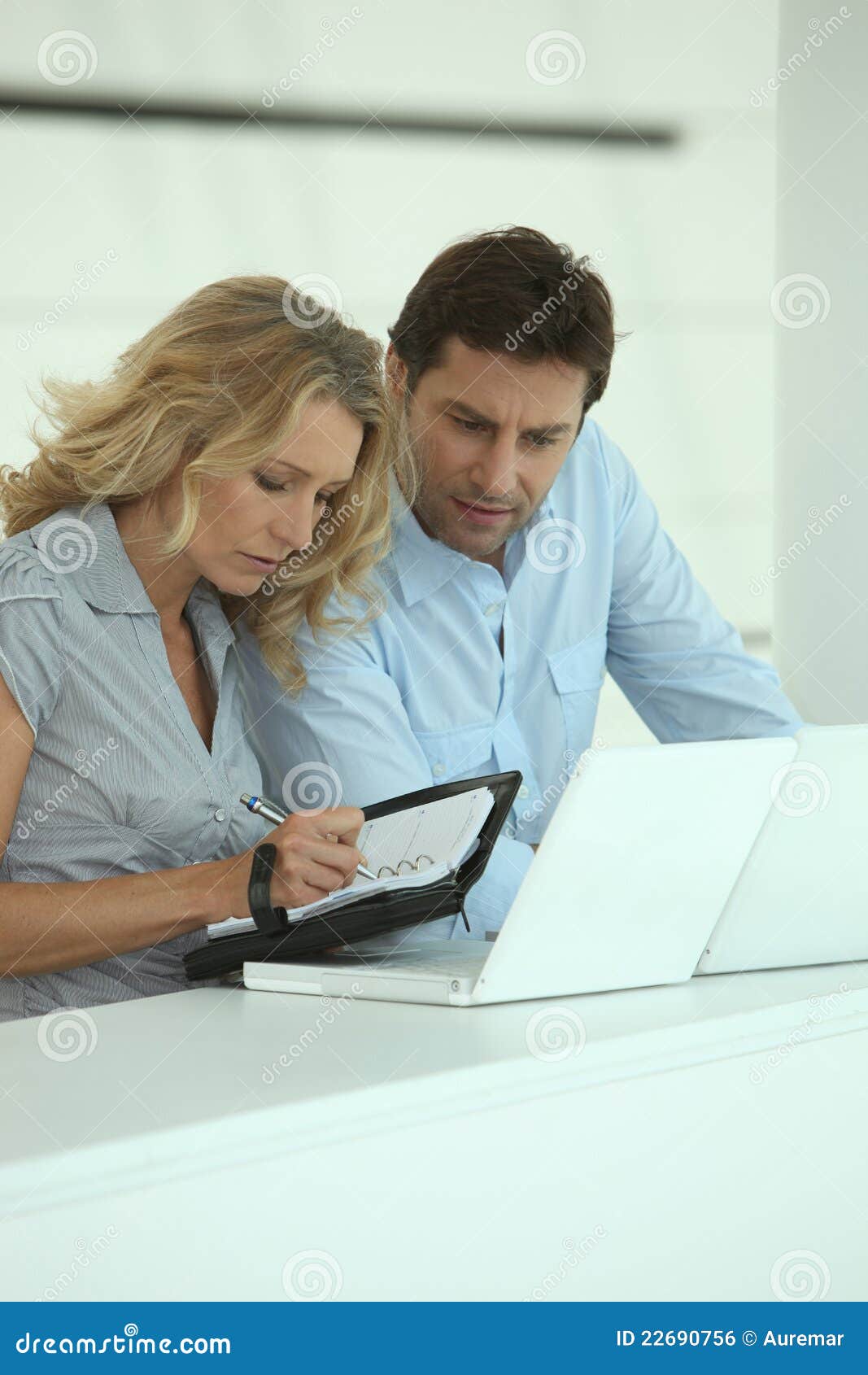 Couple writing in diary stock photo. Image of dark, white - 22690756