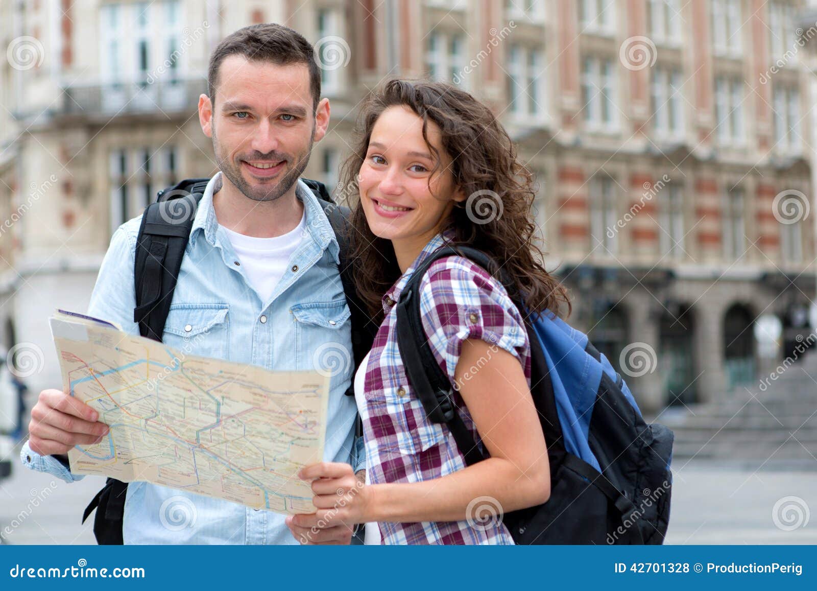 Couple of Young Attractive Tourists Watching Map Stock Photo - Image of ...