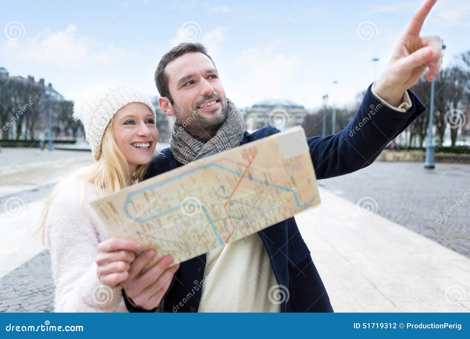 Couple of Young Attractive Tourists Watching Map Stock Photo - Image of ...