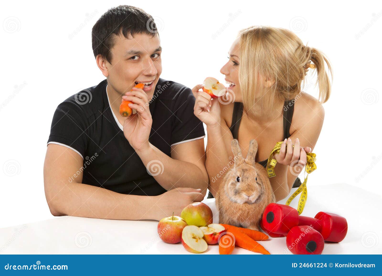 Couple with young rabbit stock photo. Image of animal - 24661224