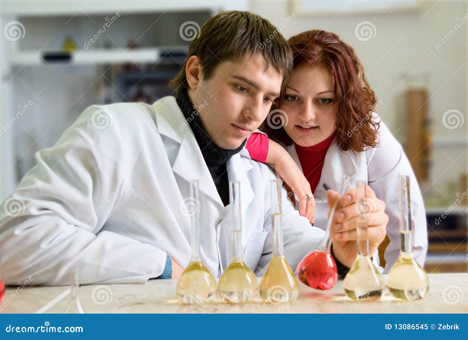 Couple of young scientists stock image. Image of learning - 13086545