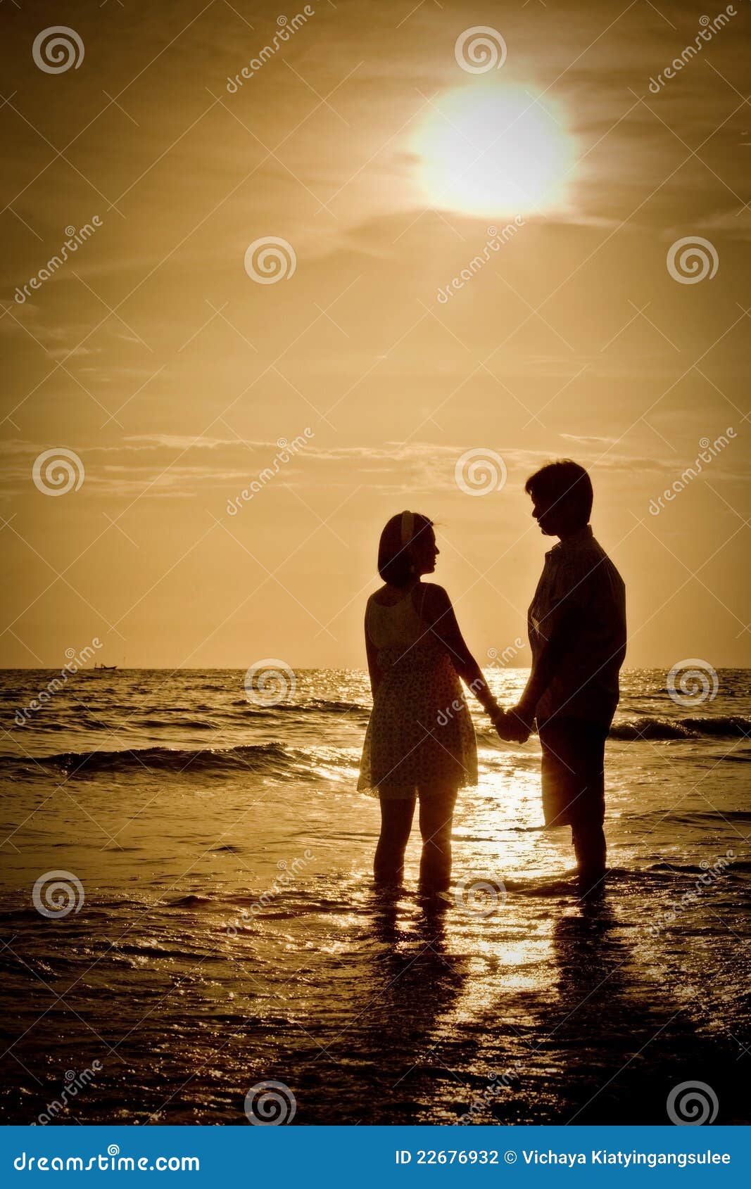 Couples at Beach sunset stock photo. Image of people - 22676932