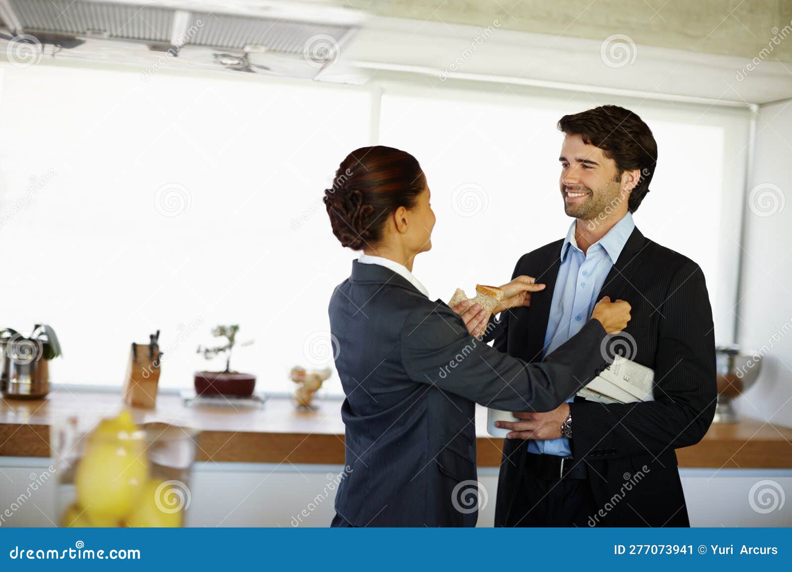 Couples Breakfast Routine. Attractive Woman Adjusts Her Husbands Jacket ...
