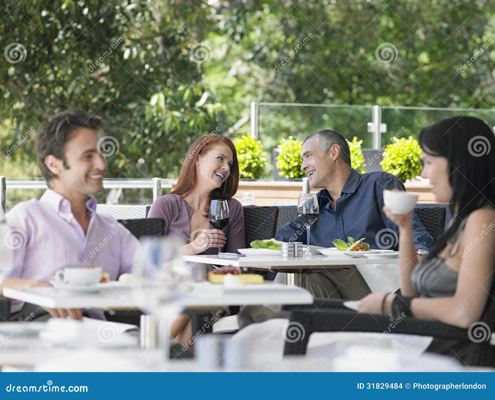 Couples Enjoying Drinks at Cafe Stock Photo - Image of focus, dating ...